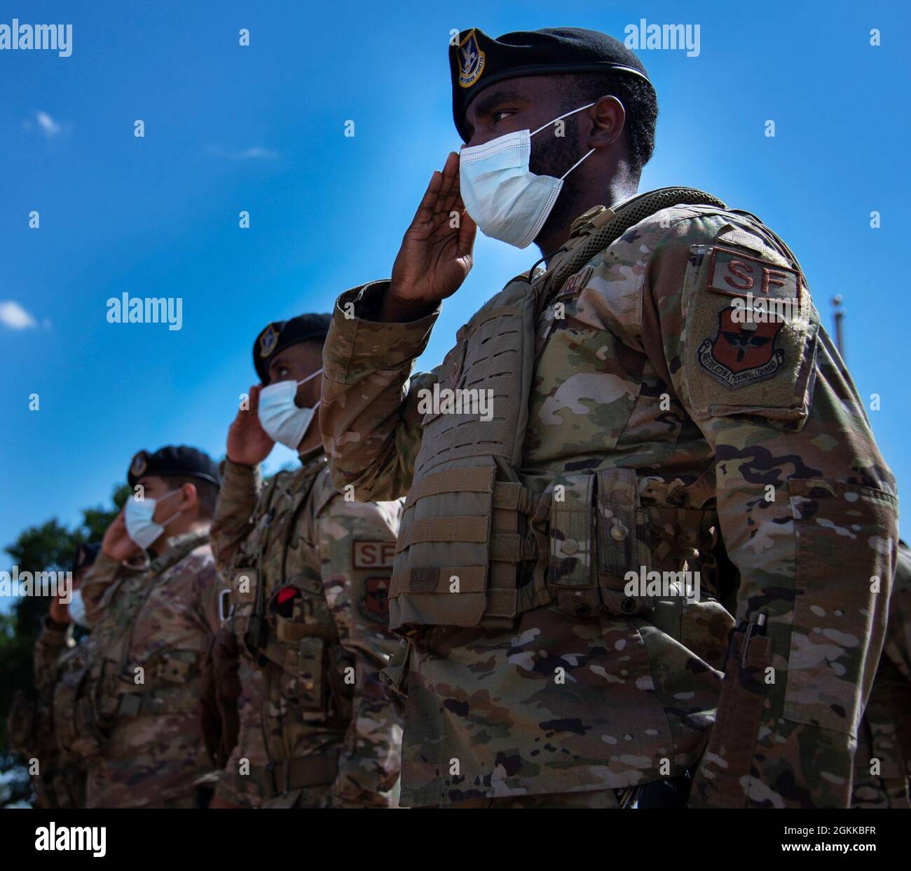 82nd Security Forces Squadron Defenders render a salute during a Police ...