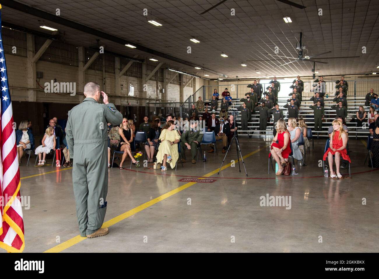 Lt. Col. Cory Henwood, 99th Flying Training Squadron commander, renders ...