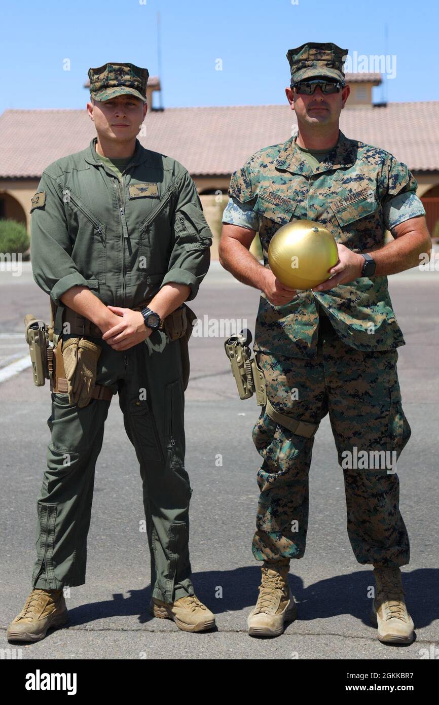 U.S. Marine Corps Cpl. Eric Sanchez, Left, and Staff Sgt. Aaron Seamons ...