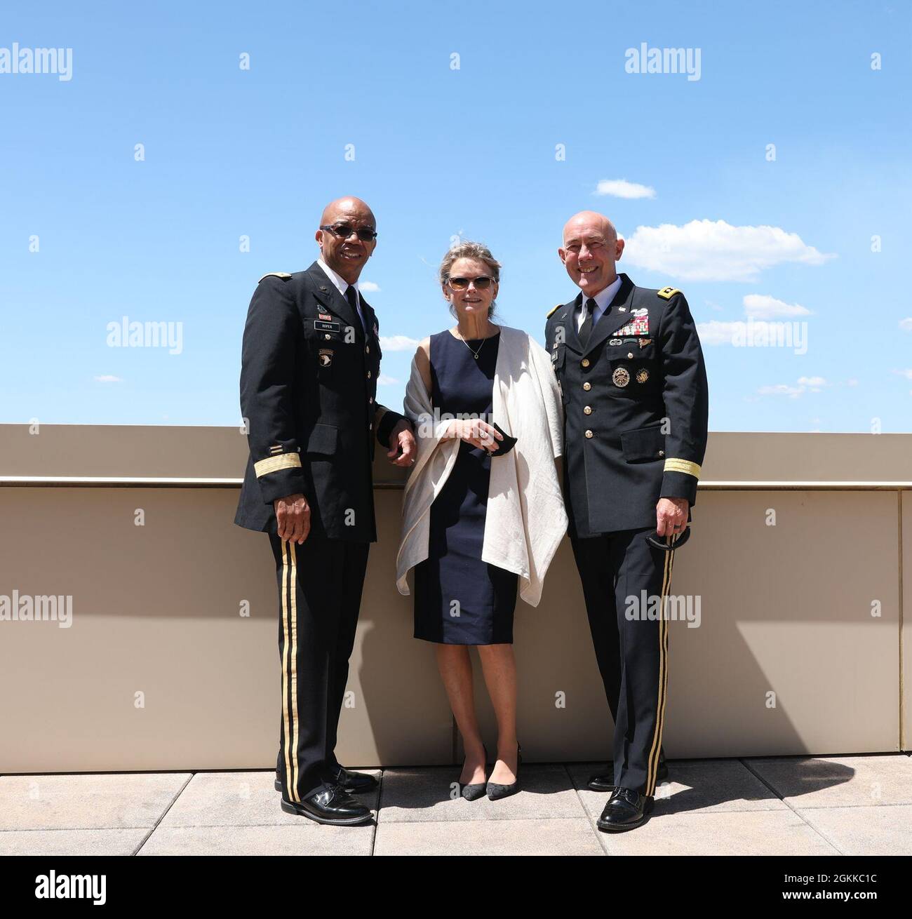 U.S. Army Reserve Lt. Gen. A.C. Roper (left), Mrs. Julie Luckey (center ...