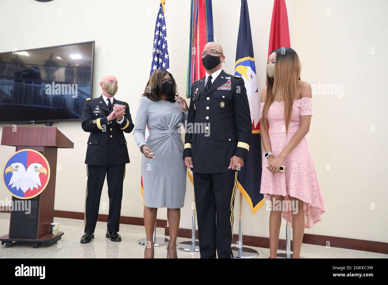 U.S. Army Reserve Lt. Gen. A.C. Roper receives his new rank by his wife ...
