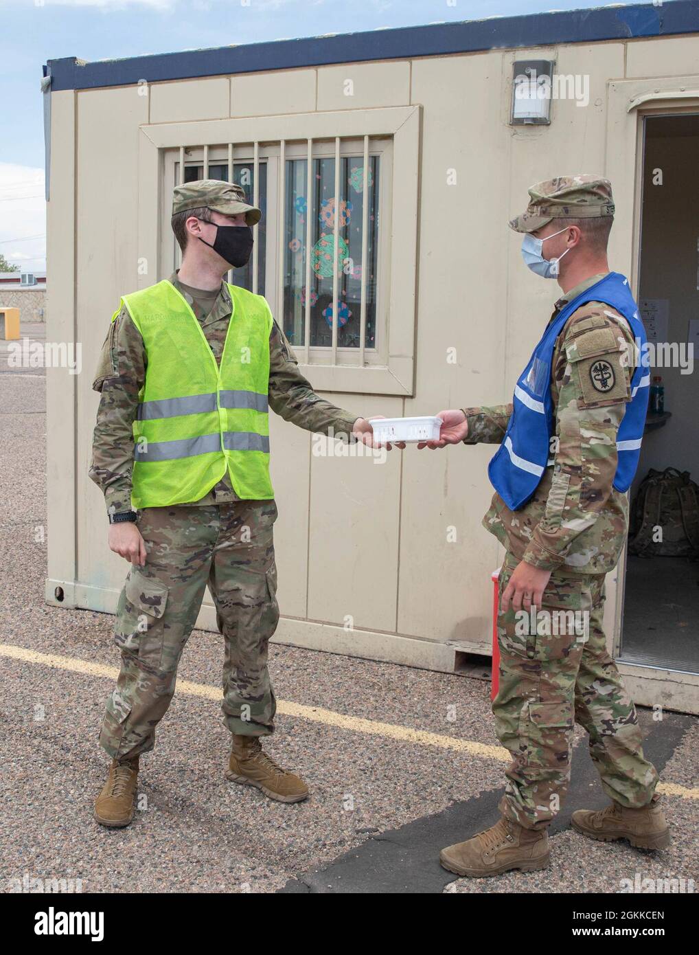 U.S. Army Spc. David Hardman, left, a combat medic assigned to 2nd ...