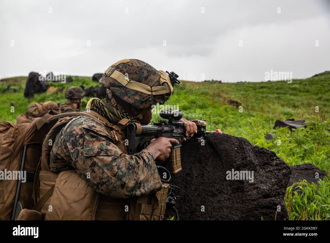 U.S. Marine Lance Cpl. Jeremy Samuel posts security while conducting a ...