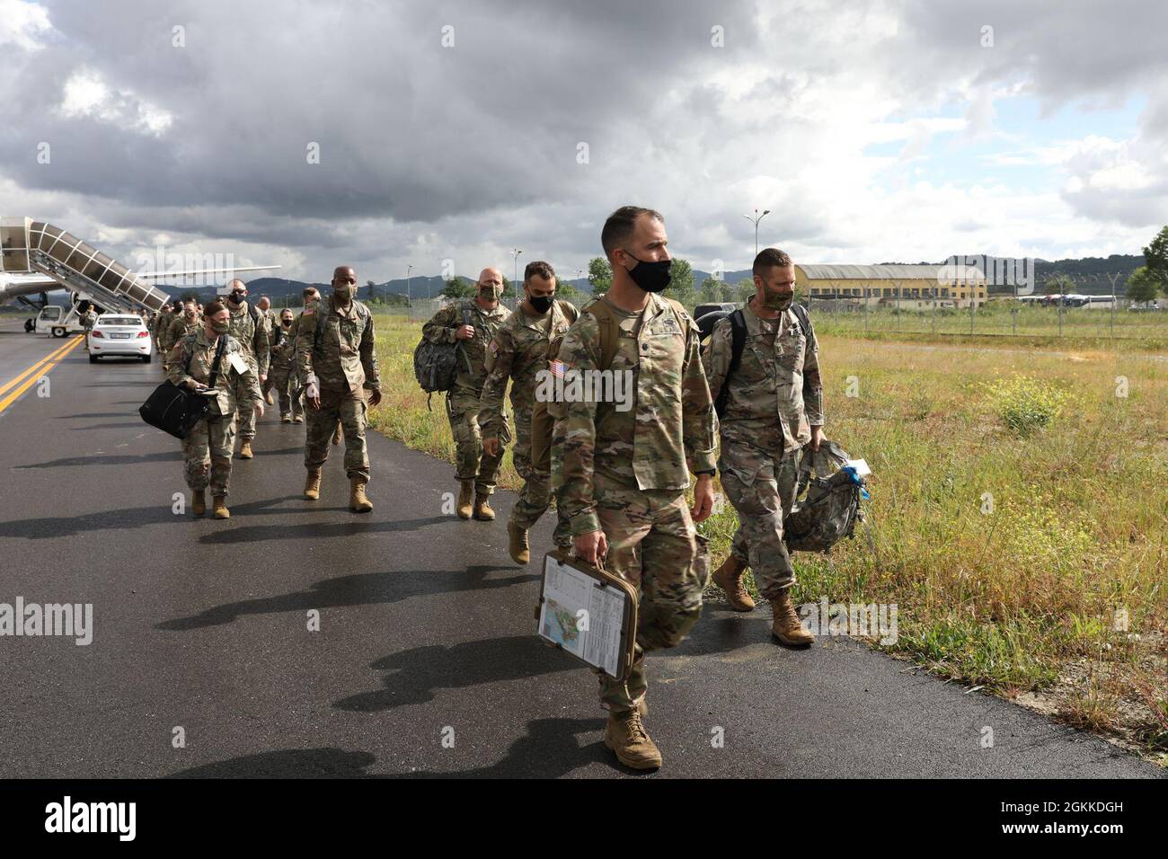 A long line of U.S. Army Soldiers assigned to the Florida Army National ...