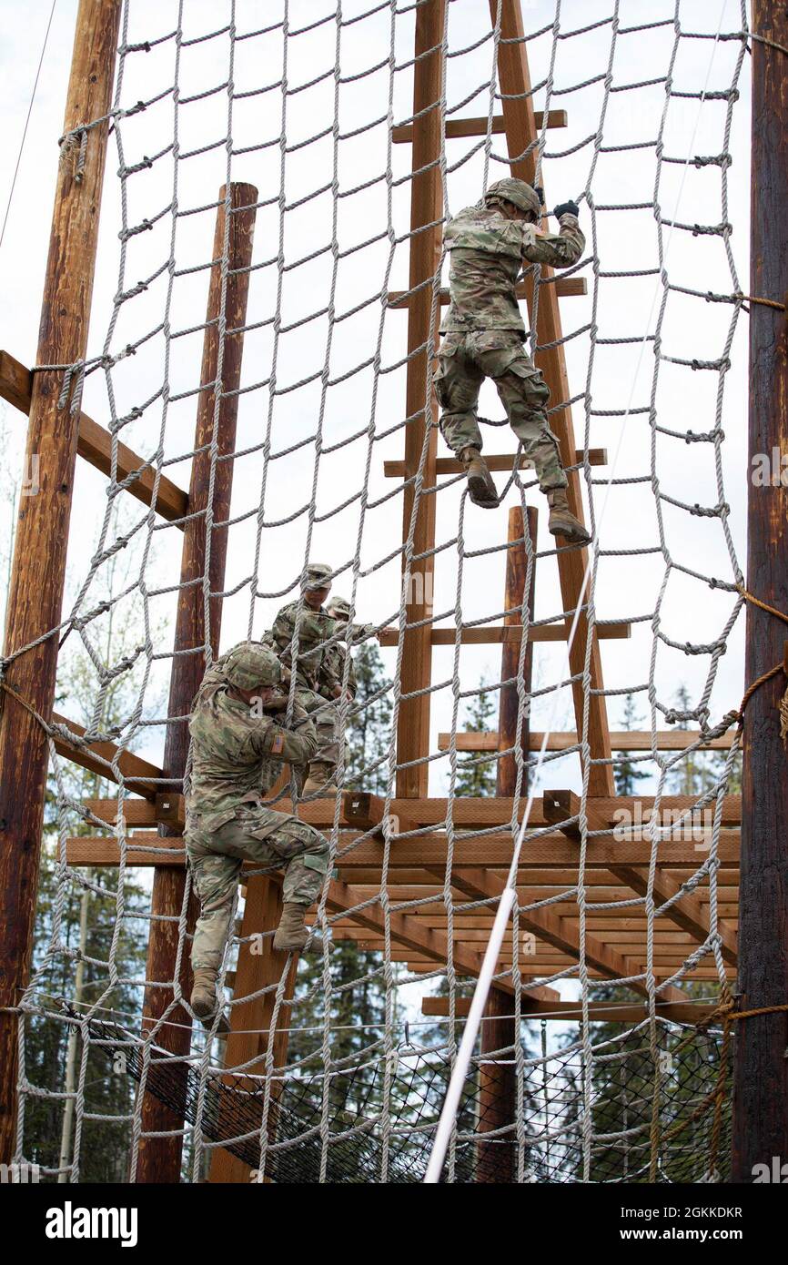 Alaska Army National Guardsmen descend on the obstacle course that is a ...