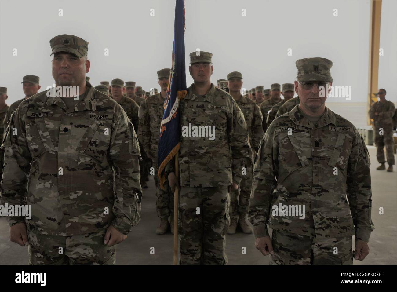 Lt. Col. Tyler Smentek (left), commander of the 1st Battalion, 168th ...