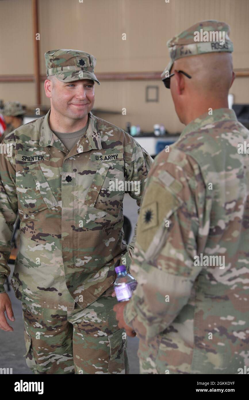 Lt. Col. Tyler Smentek (left), commander of 1st Battalion, 168th ...