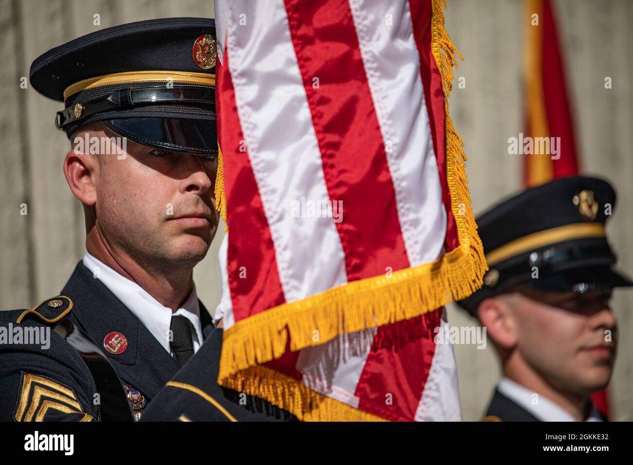 An honor guard, comprised of members of the Utah National Guard walks ...