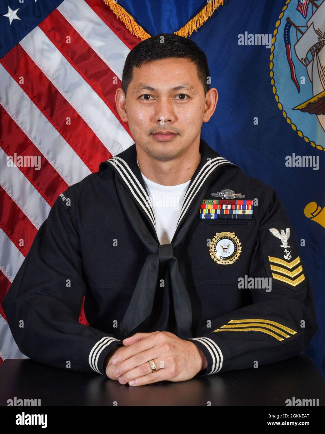 210515-VH839-N-1001 Navy Counselor 1st Class Marvin Tan poses for an ...