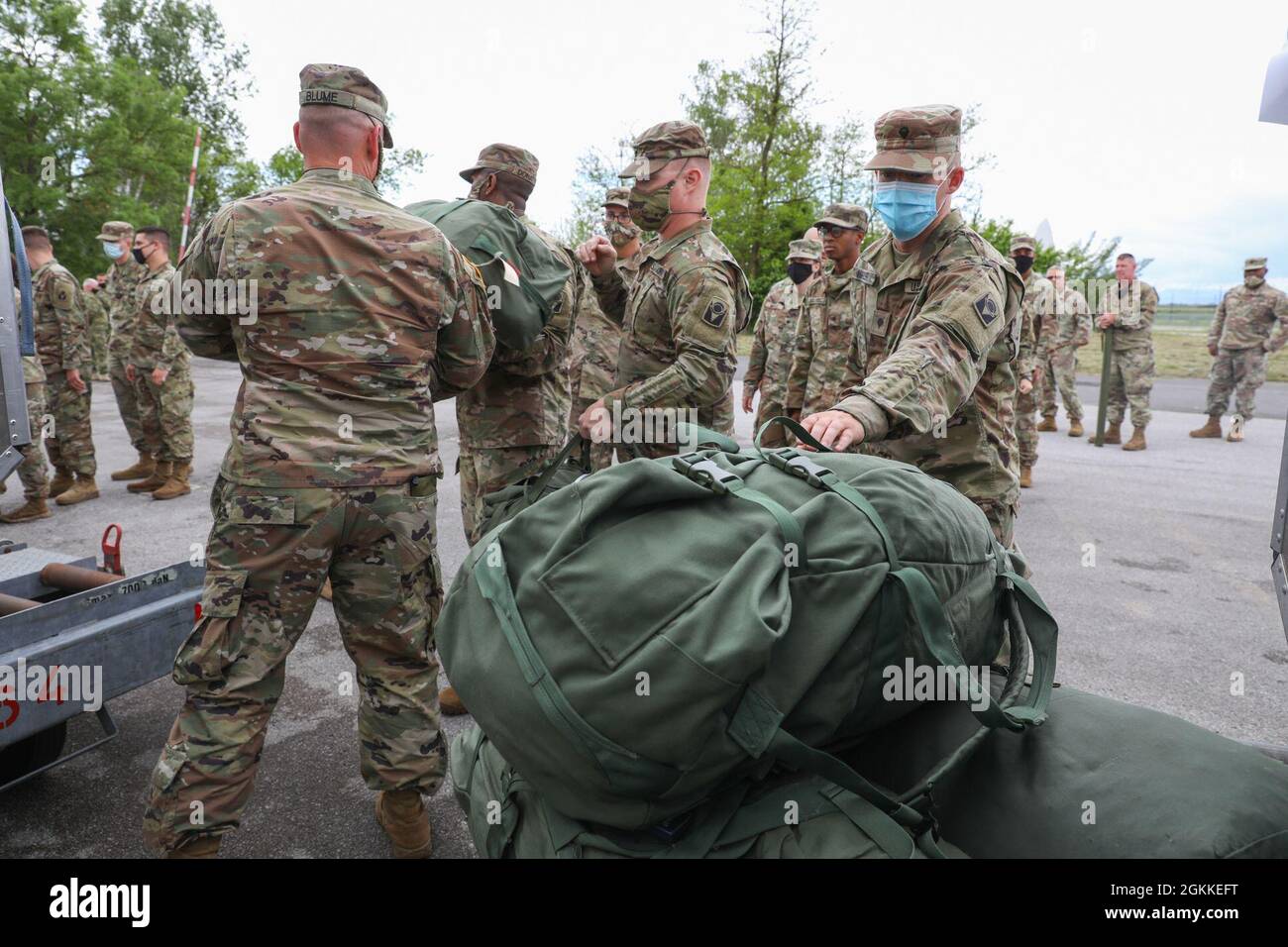 Florida National Guard Spc. Jared Marler, right foreground, a cannon ...