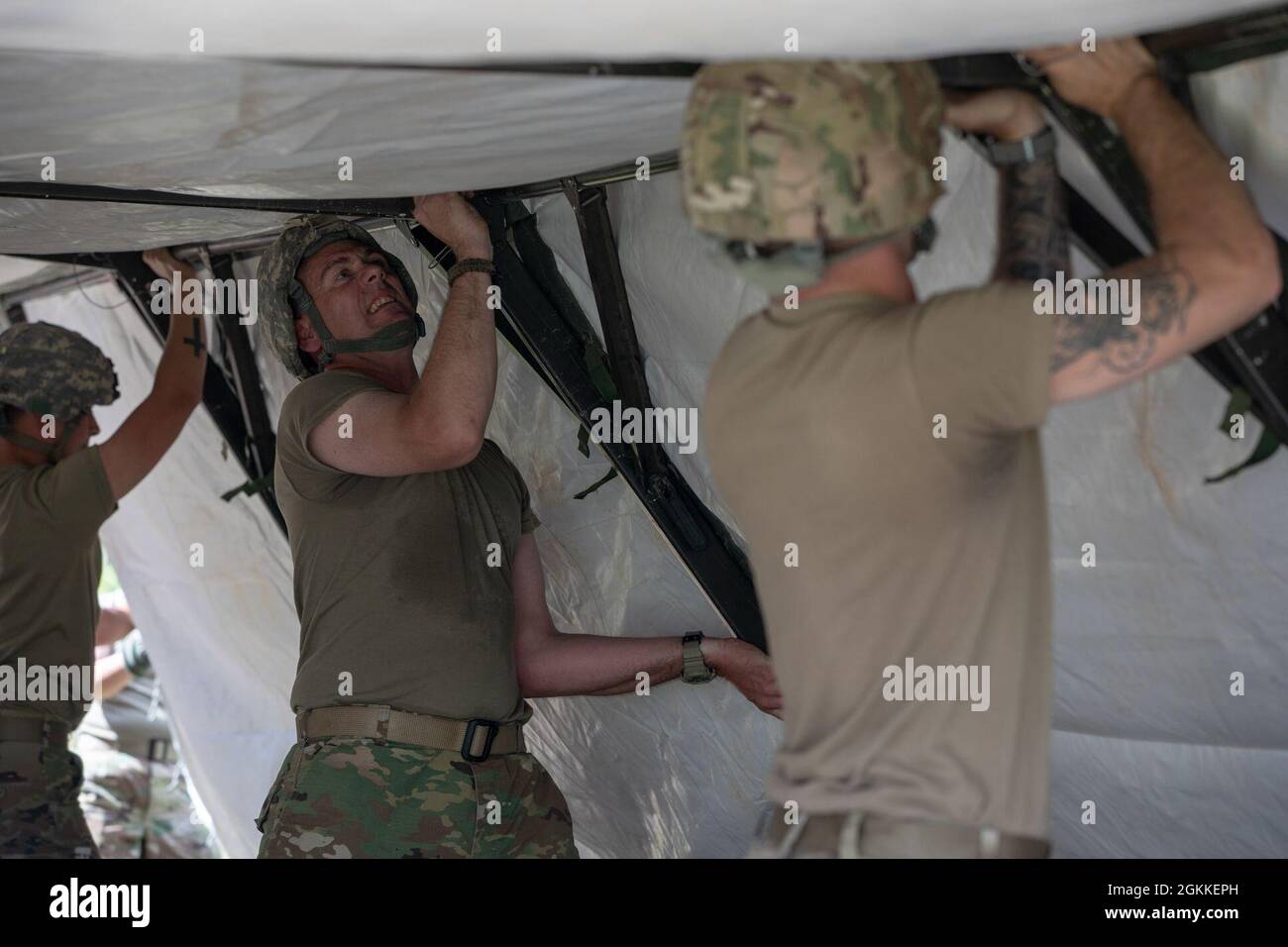 (FARKE AIRFILED, Albania) --- Sgt. John Combs, UH-60 Blackhawk repair ...