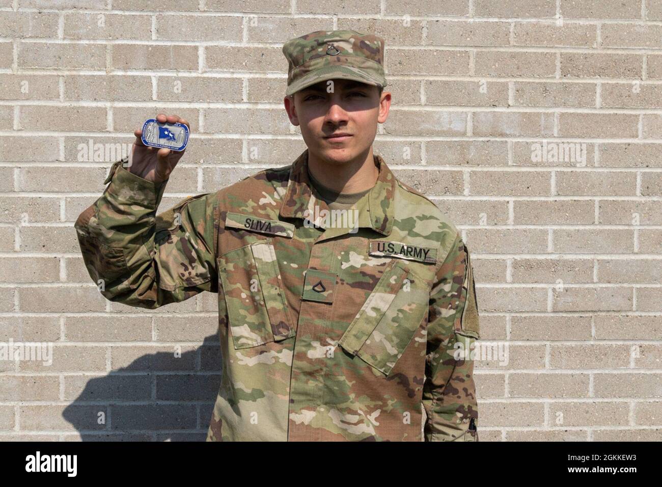 Pfc. Gavin Silva, a Signal Support Systems Specialist with HHC, 1-376th ...