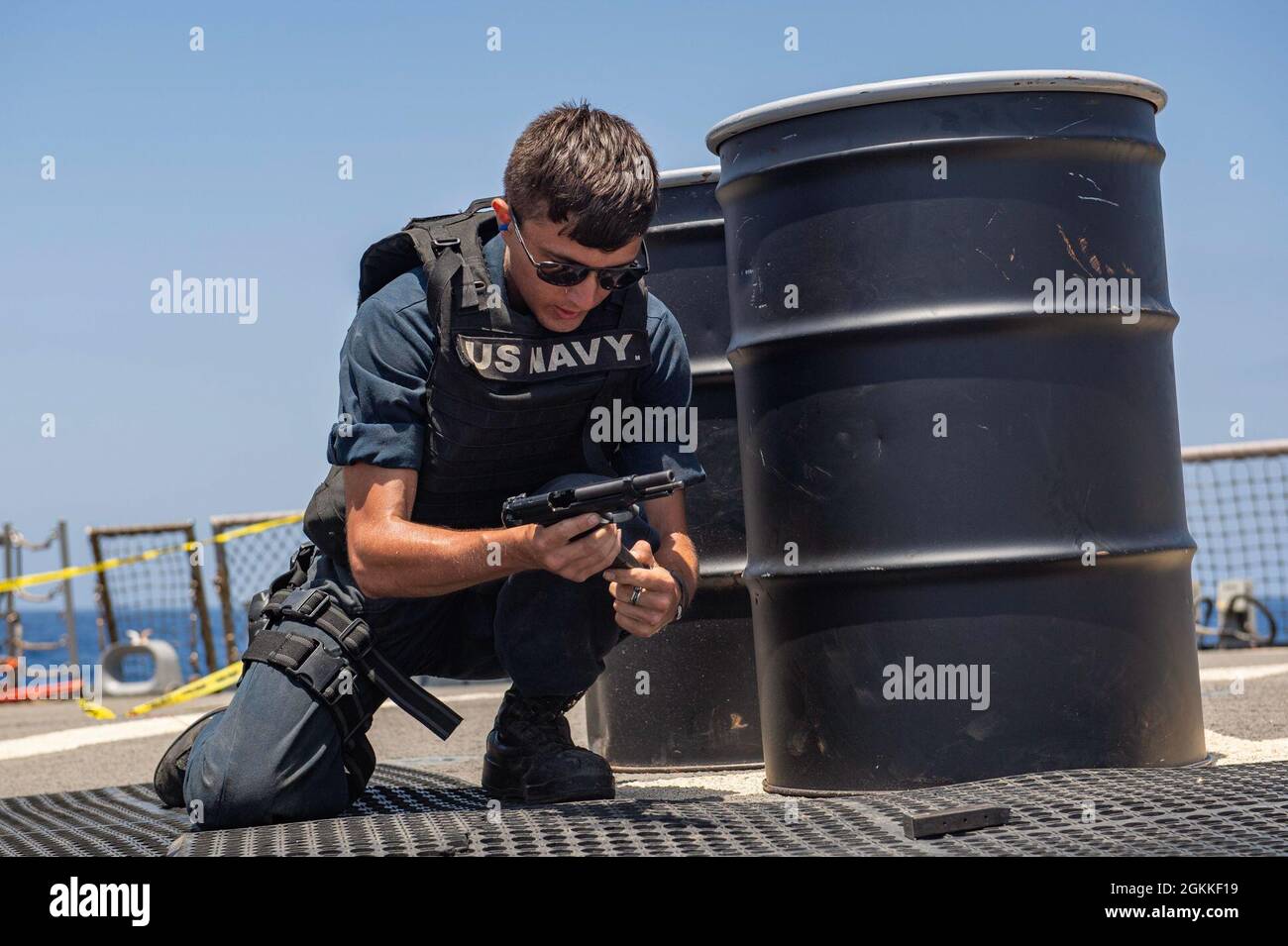 ARABIAN SEA (May 16, 2021) – Gunner’s Mate 3rd Class Corey Crumley ...