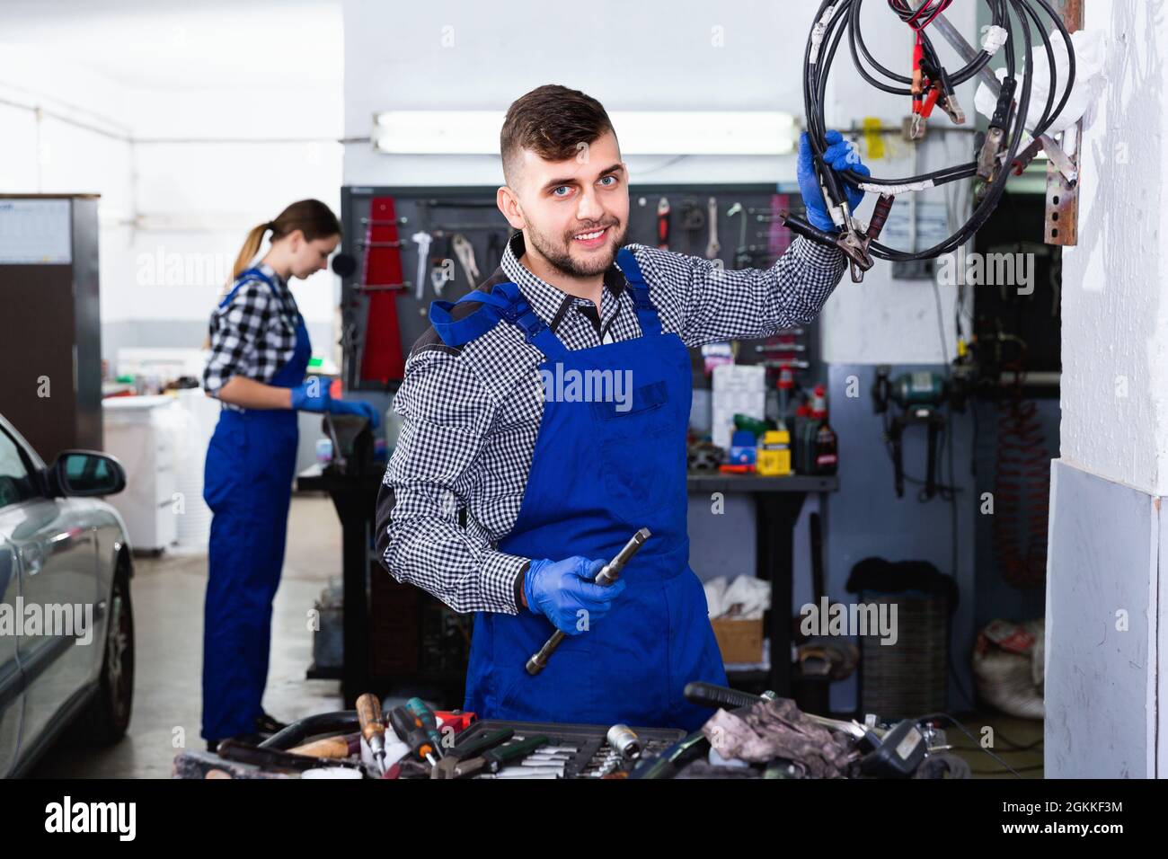 Male worker choosing instruments hi-res stock photography and images ...