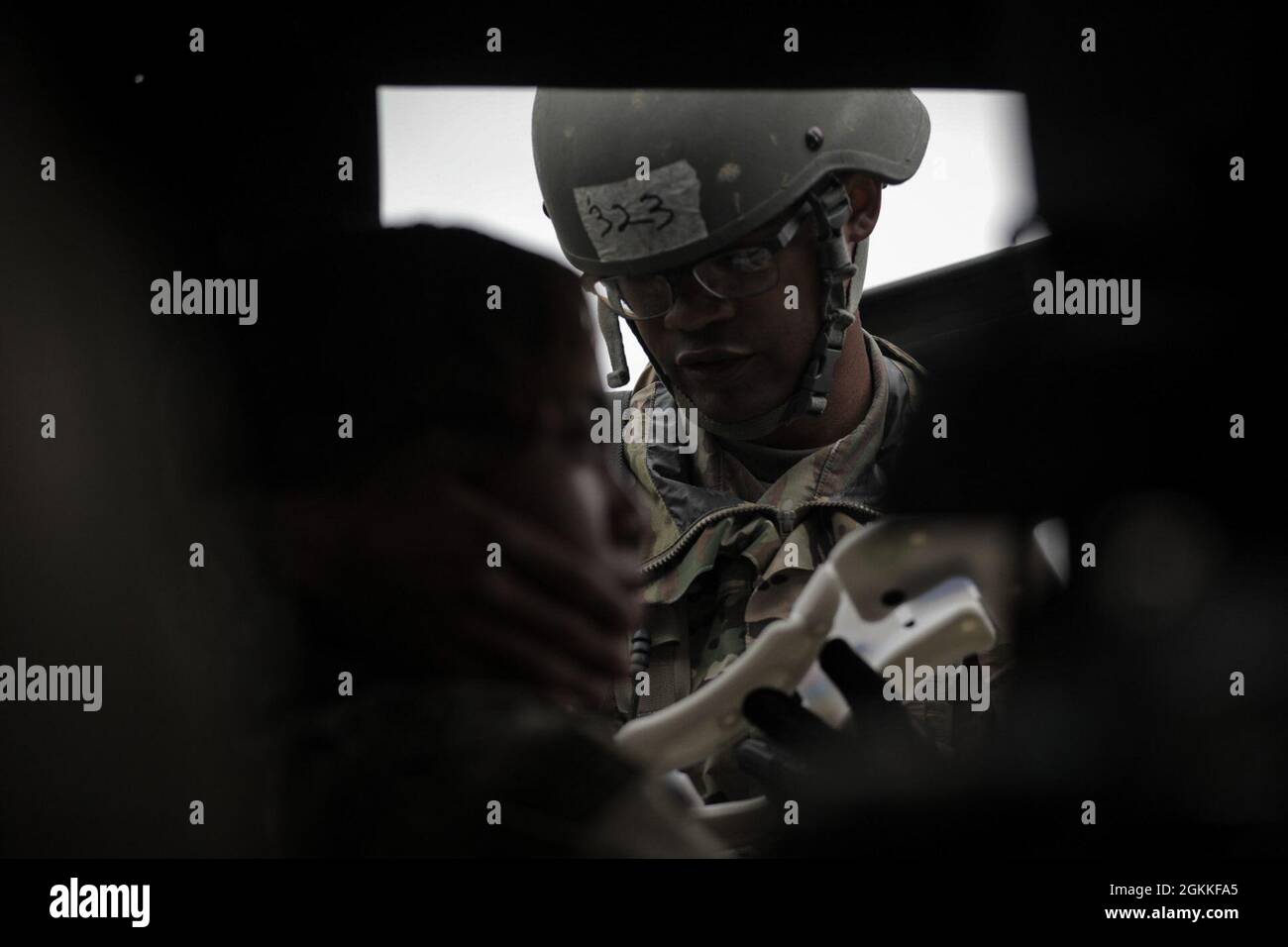 A U.S. Army Expert Field Medical Badge (EFMB) candidate, participates ...