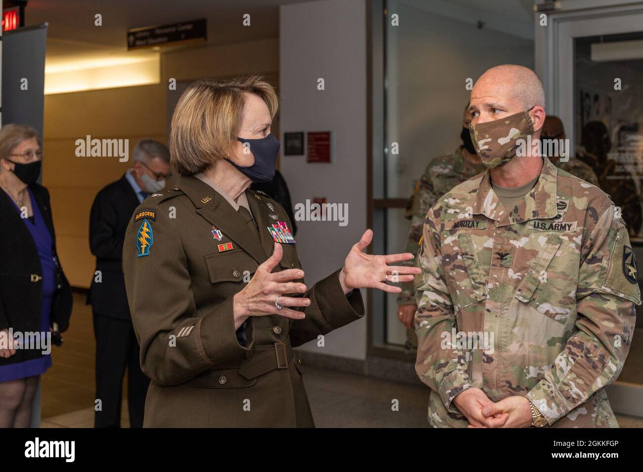 Col. Clinton Murray (right), WRAIR commander, provides an introductory ...