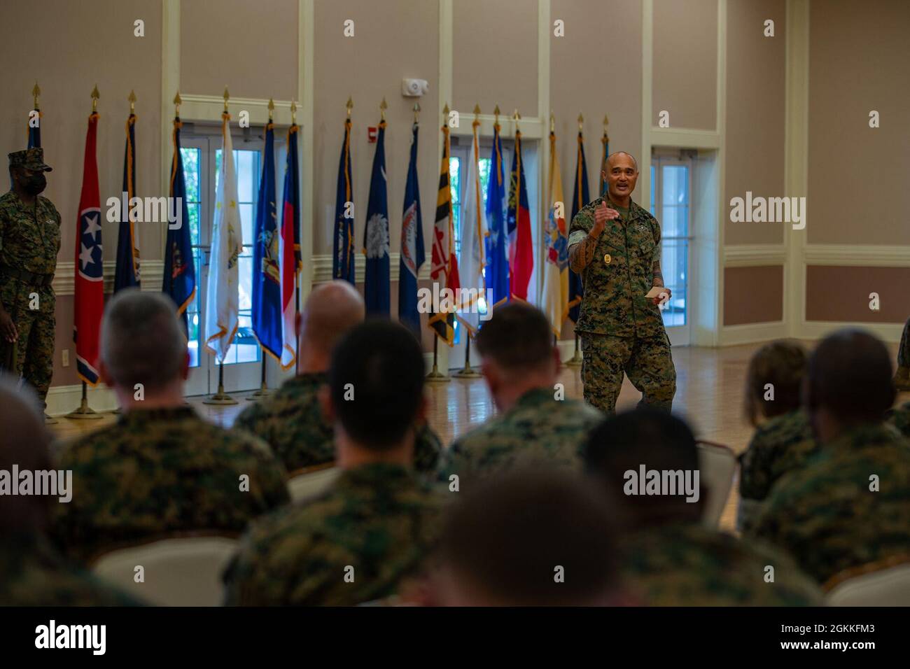 U.S. Navy Master Chief Petty Officer Christopher Rebana gives closing ...