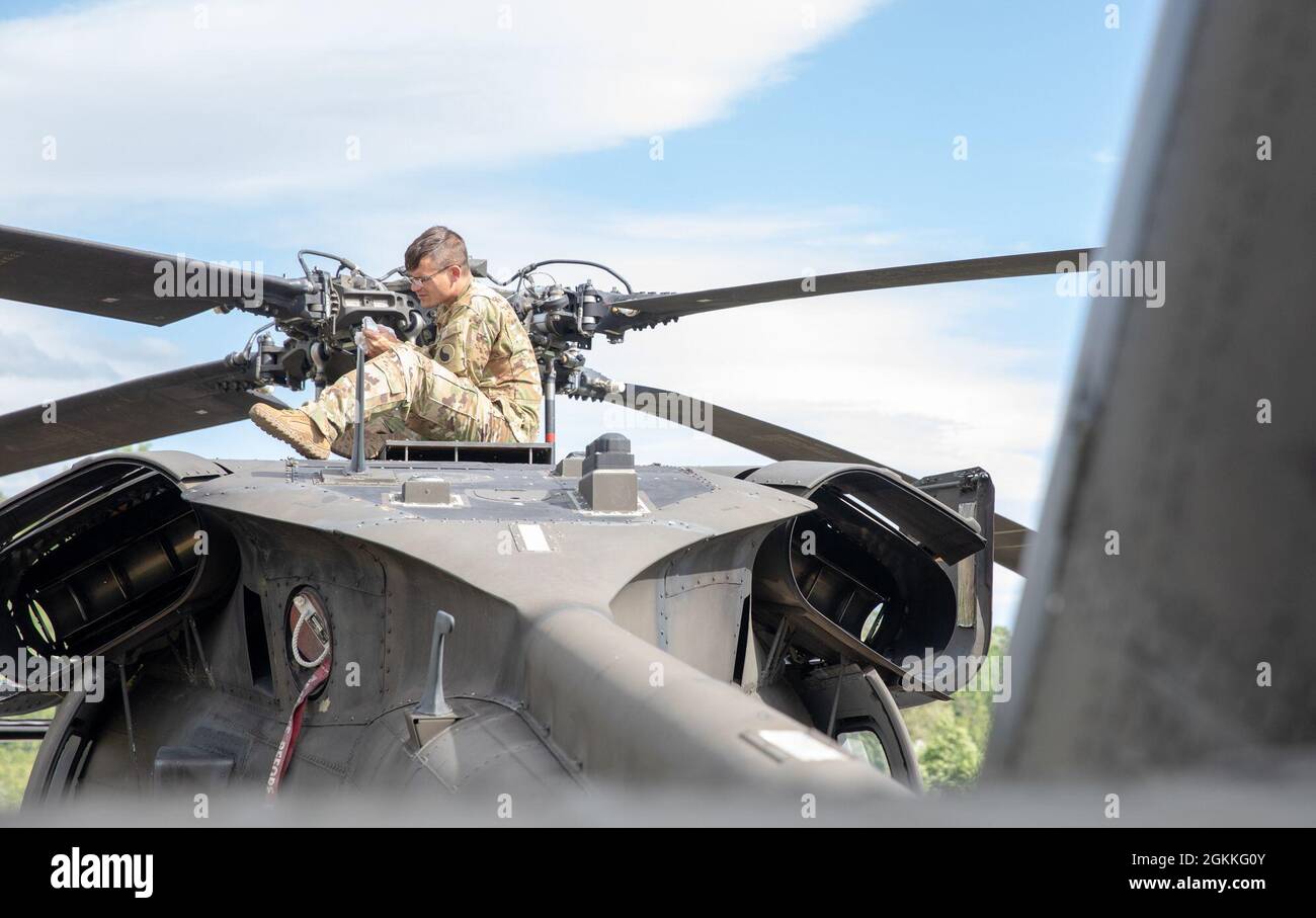 (FARKE AIRFIELD, Albania) --- Sgt. Justin Howard, a crew chief with the ...