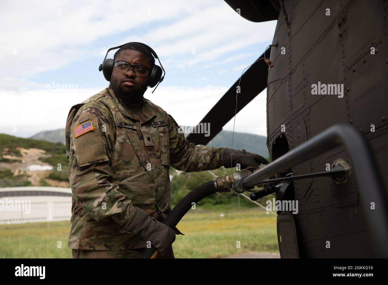 (FARKE AIRFIELD, Albania) --- Spc. Darius Howard, an aircraft fueler ...