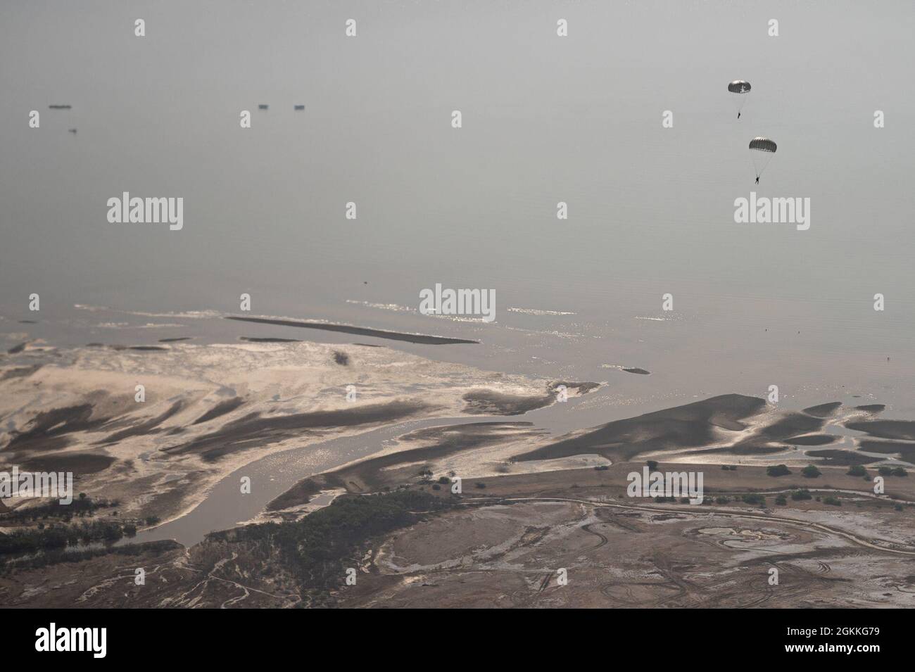 U.S. Air Force pararescue Airmen perform static line and military free ...