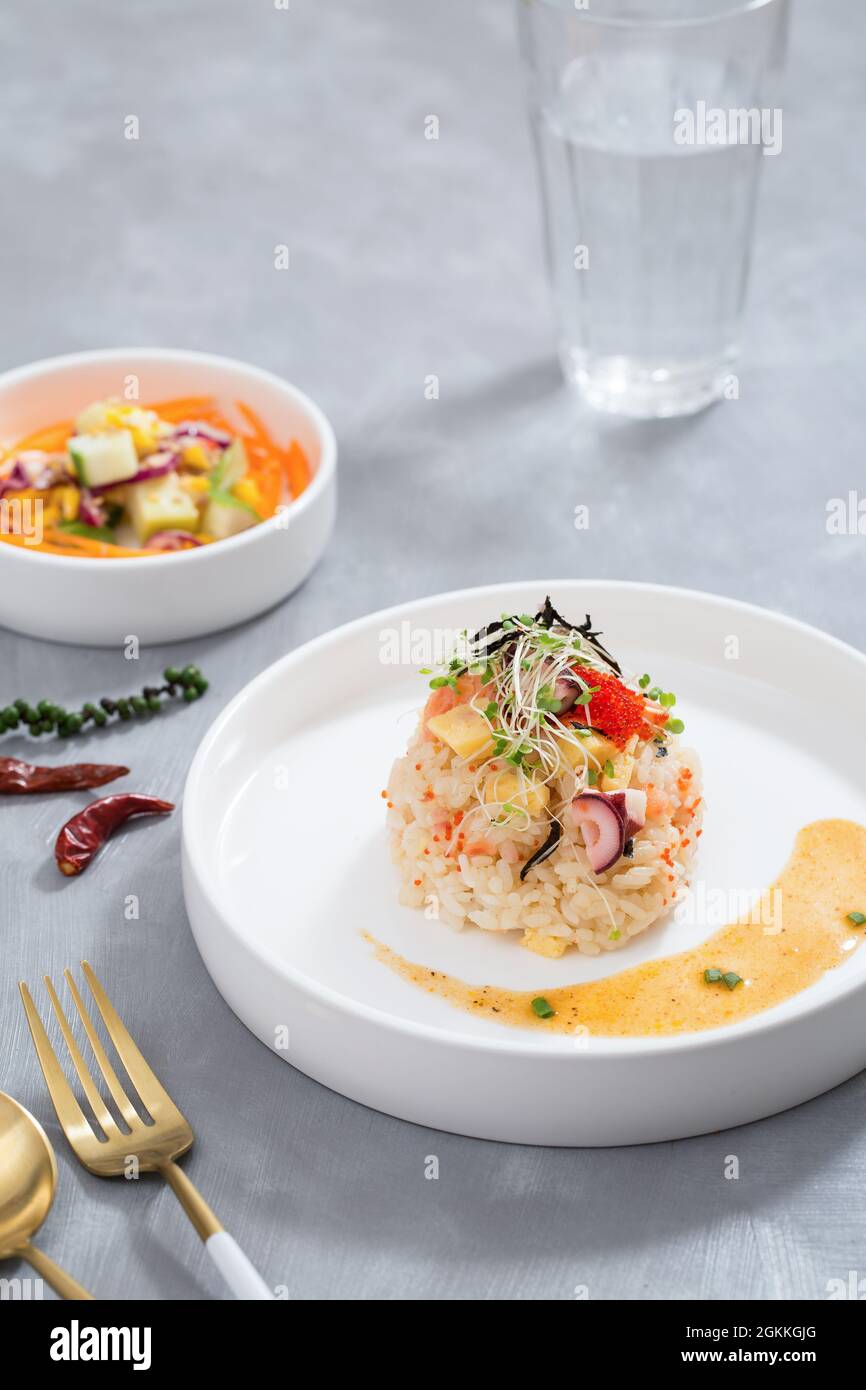 Top view eating healthy meal, rice with salmon roe, mixed salads, and ...