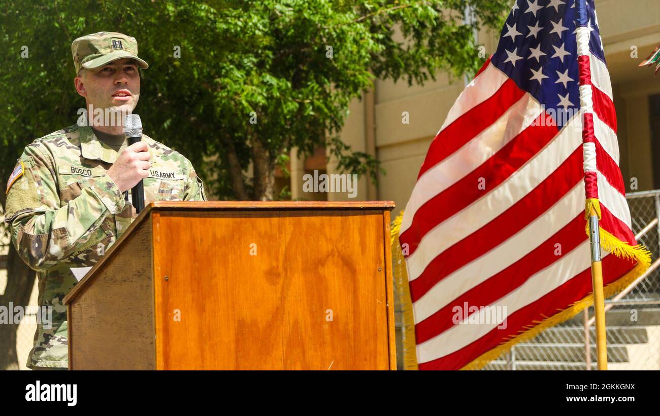 With Old Glory fluttering in the desert breeze, U.S. Army Capt. Eric J ...