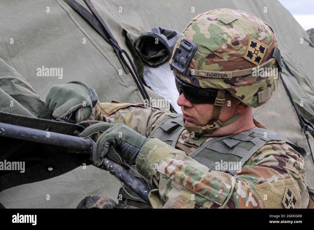 U.S. Army Staff Sgt. William Horton, a chaplain’s assistant assigned to ...