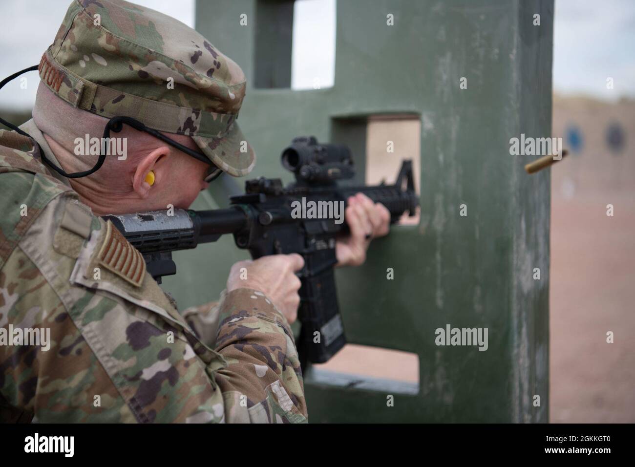 Maj. Gen. Michael Lutton, 20th Air Force commander, fires a weapon at ...