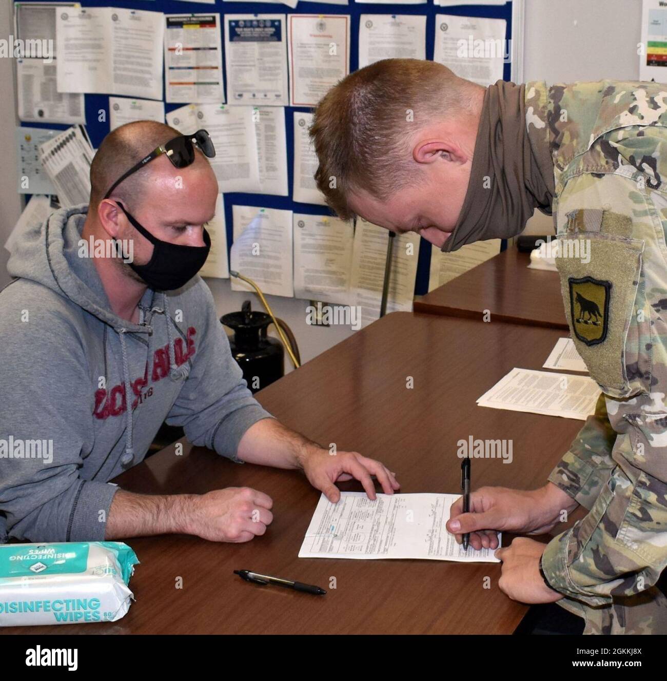 Following container loading, the tractor trailer passes through yet ...