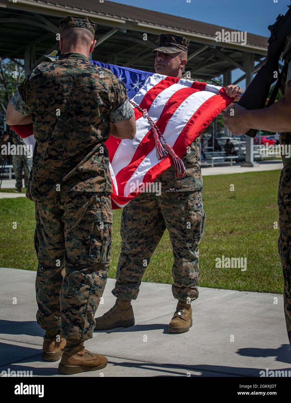 U.S. Marine Corps Lt. Col. Neil Berry , commanding officer, left, and ...
