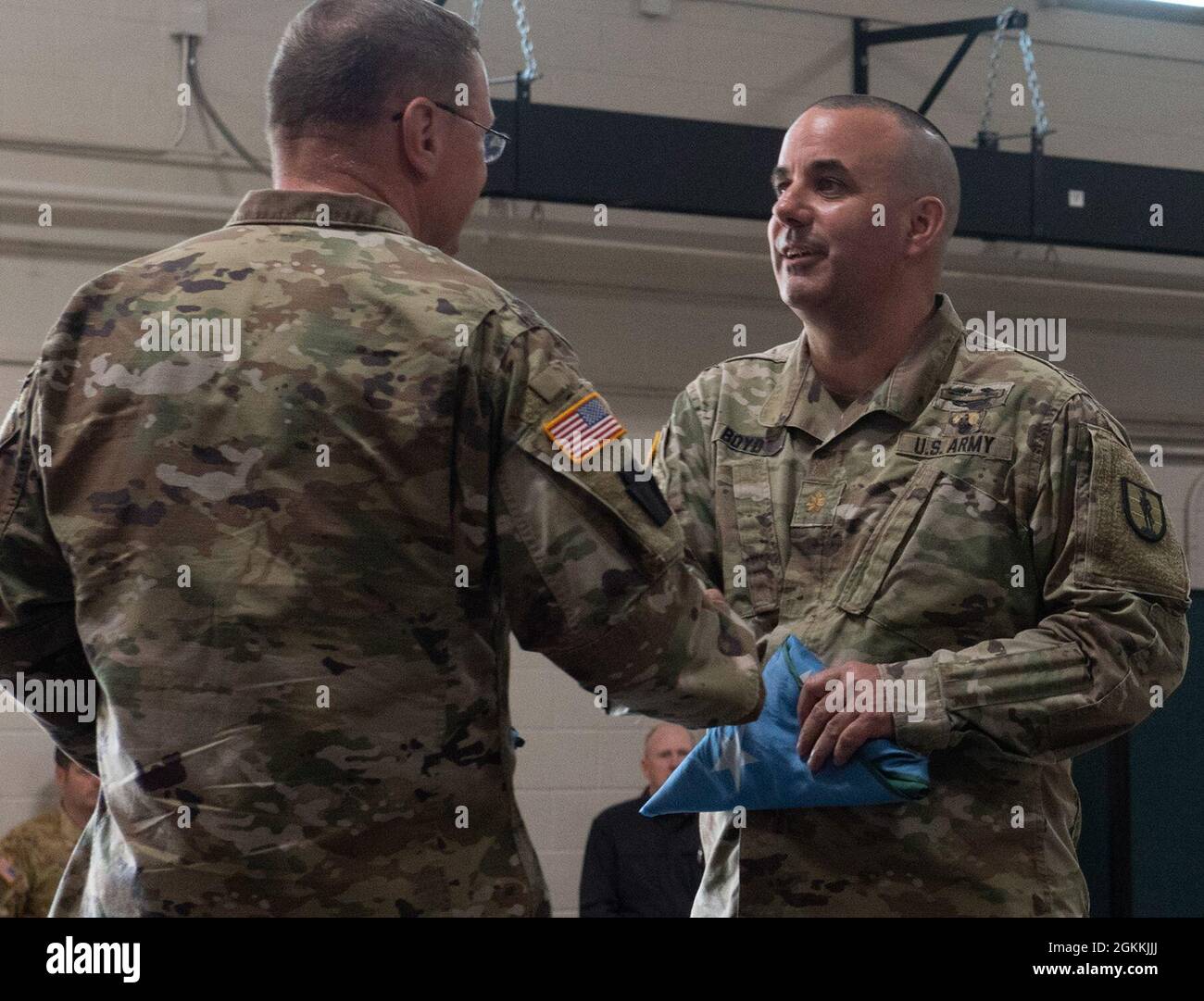 Maj. Jasen Boyd, commanding officer for Task Force Mansfield, receives ...