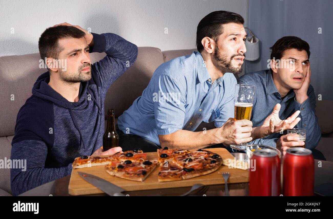 Worried men watching match hi-res stock photography and images - Alamy