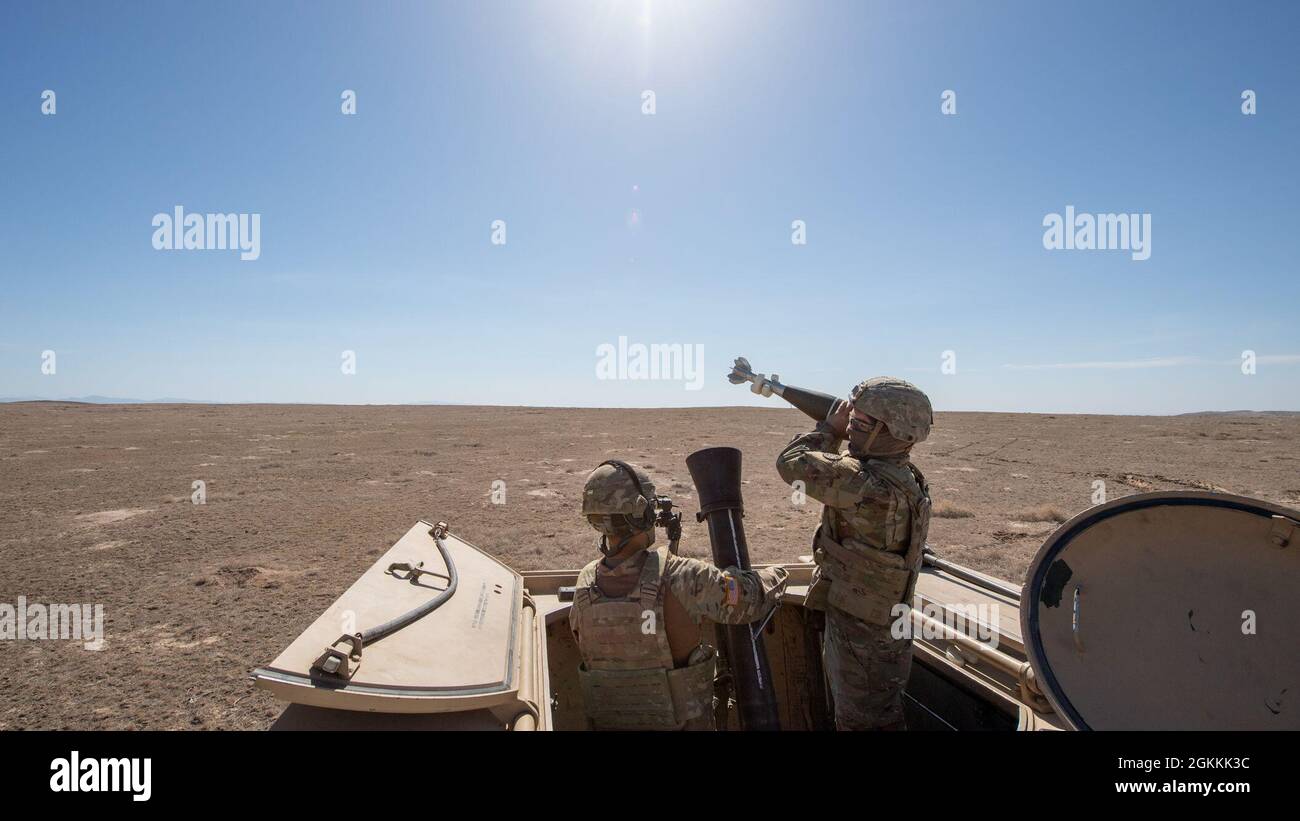 Specialist Barber, a gunner with the 2-116 Combined Arms Battalion, and ...