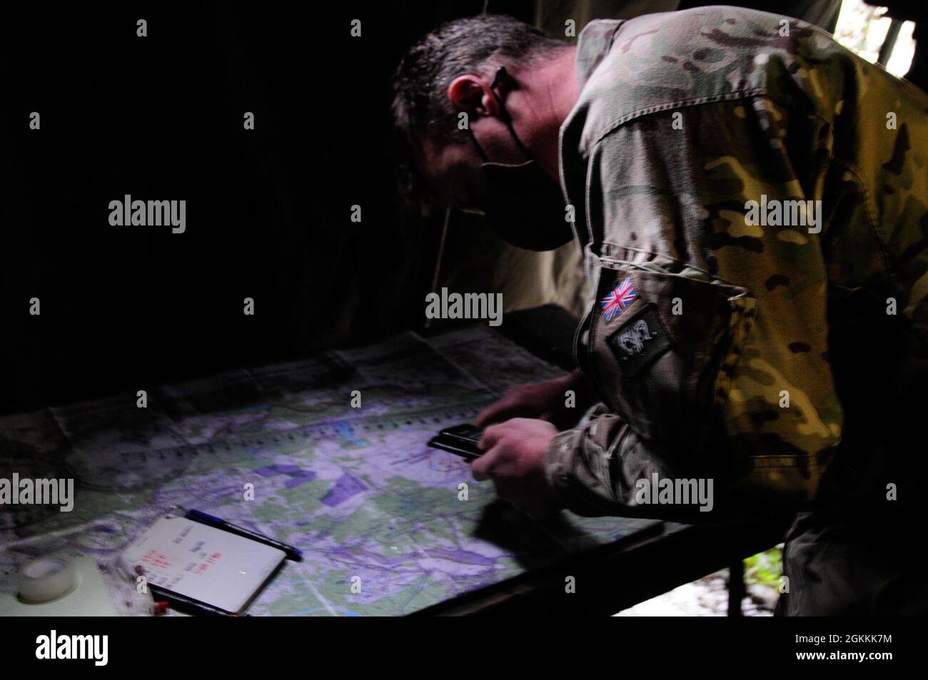 British Army Capt. Bryn Pugh, the Liaison and fire direction officer ...