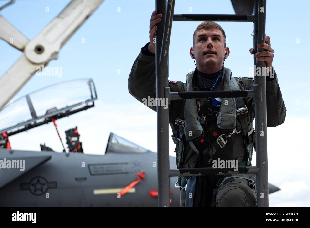 A U.S. Air Force pilot assigned to the 492nd Fighter Squadron climbs ...