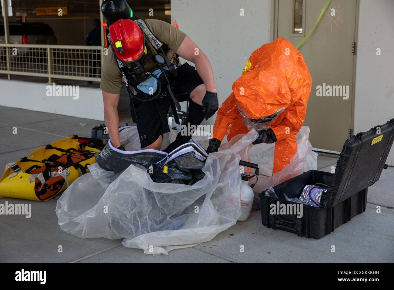 Tech Sgt. Eric McComb, 103rd Civil Support Team, and Sgt. Andrew Hunt ...