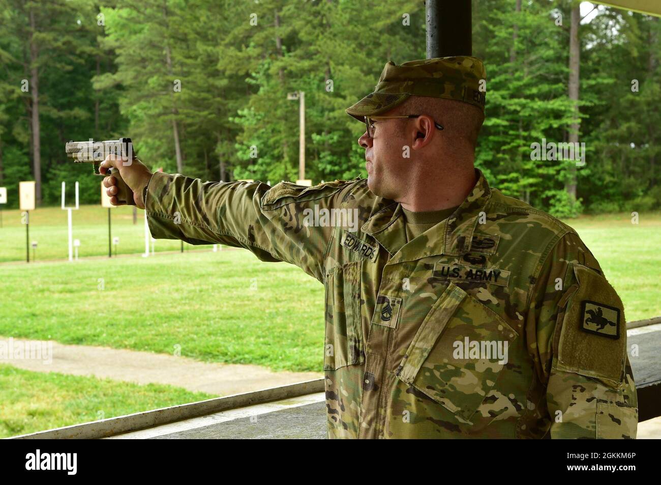 Sgt. 1st Class Joshua Edwards engages his target while only being ...