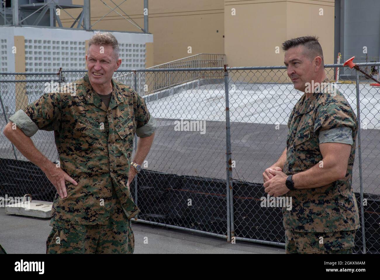 Lt. Col. Tate Buntz, the Marine Corps Base (MCB) Camp Blaz Operations Officer, right, briefs ...