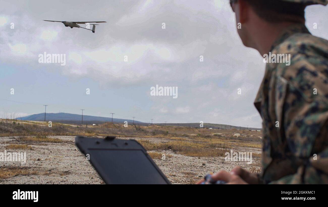 U.S. Marine Corps Cpl. Hudson Poole, an unmanned aerial systems ...