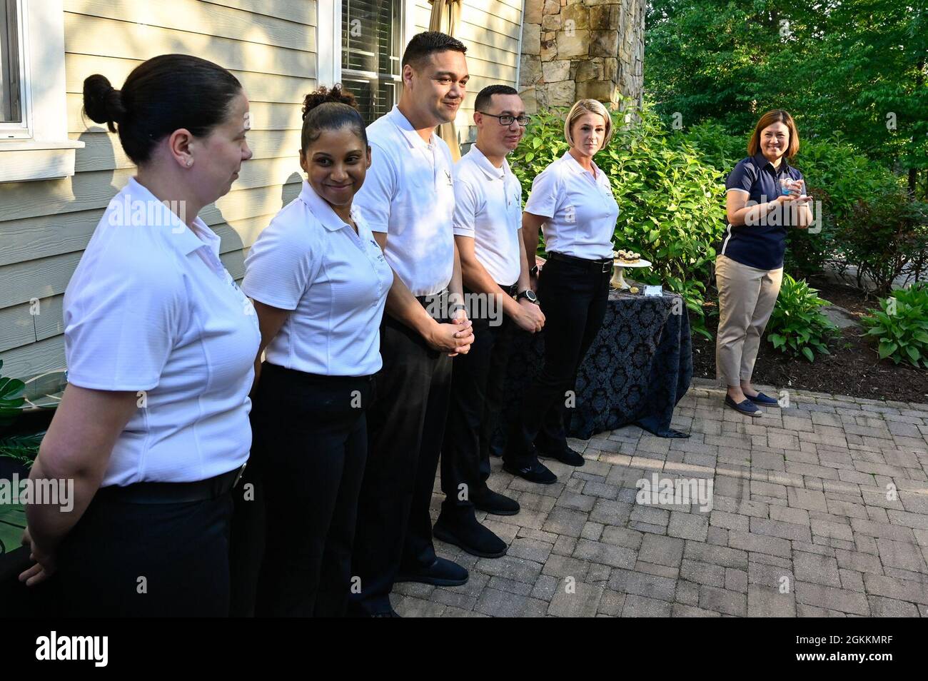 Chief Master Sergeant of the Air Force JoAnne S. Bass, right, applauds ...