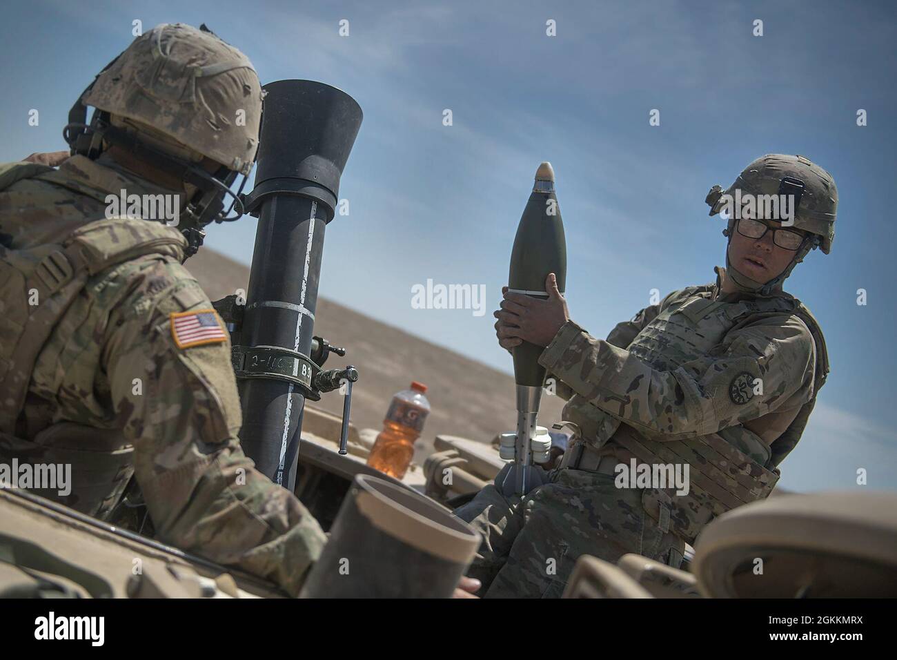 Idaho Army National Guard soldier Spc. Joey Barber prepares to load a ...
