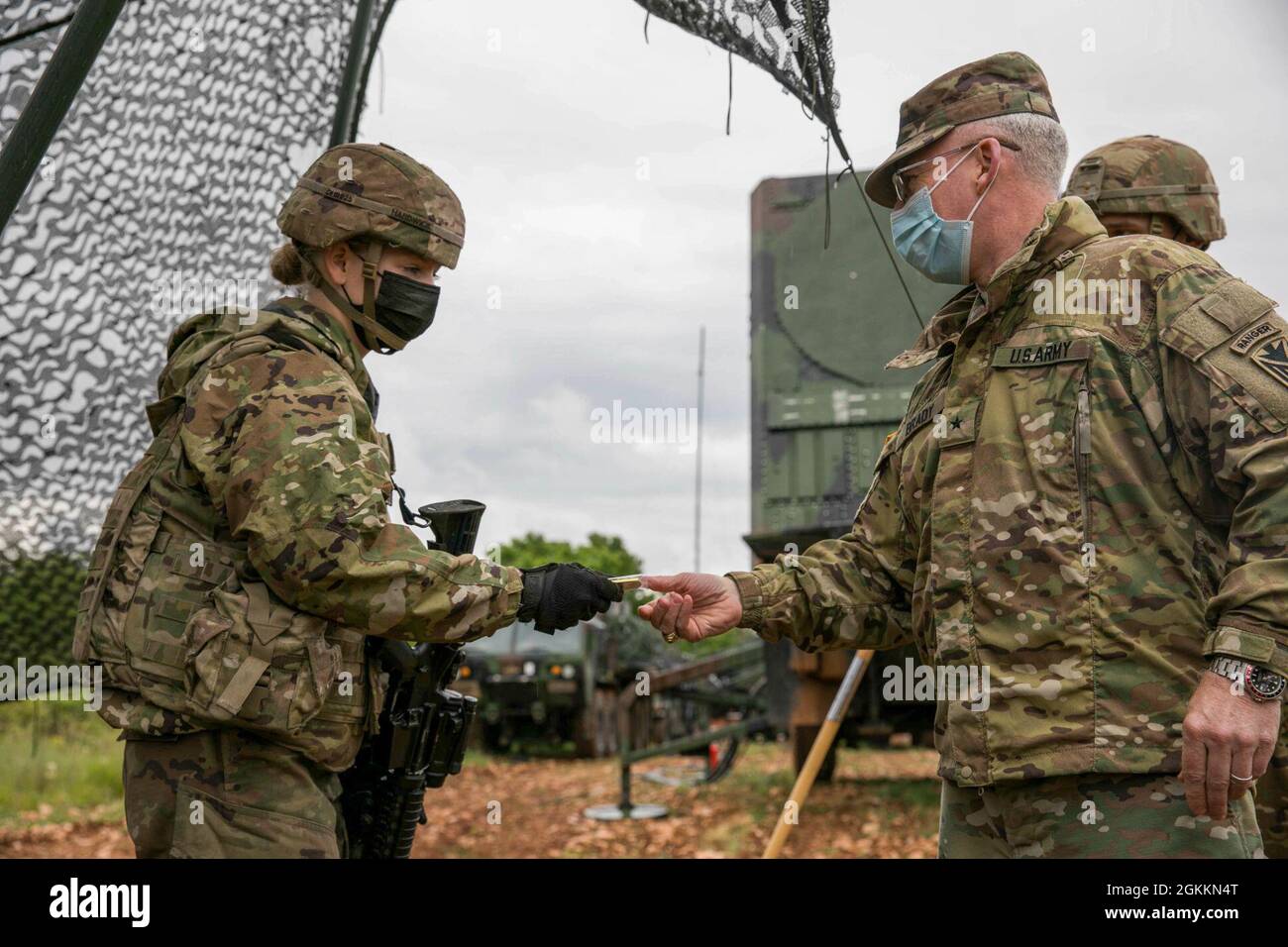U.S. Army Pfc. Dakota Hardwick, left, a Sacramento, California, native ...