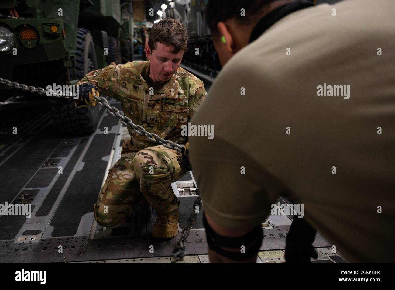 U.S. Air Force Tech. Sgt. Joe Campbell, a loadmaster assigned to the ...