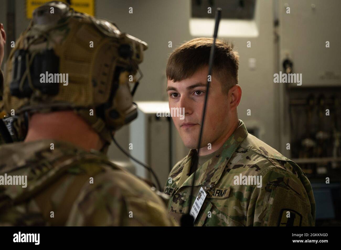 U.S. Army Staff Sgt. Joshua McKee, right, a fire control ...