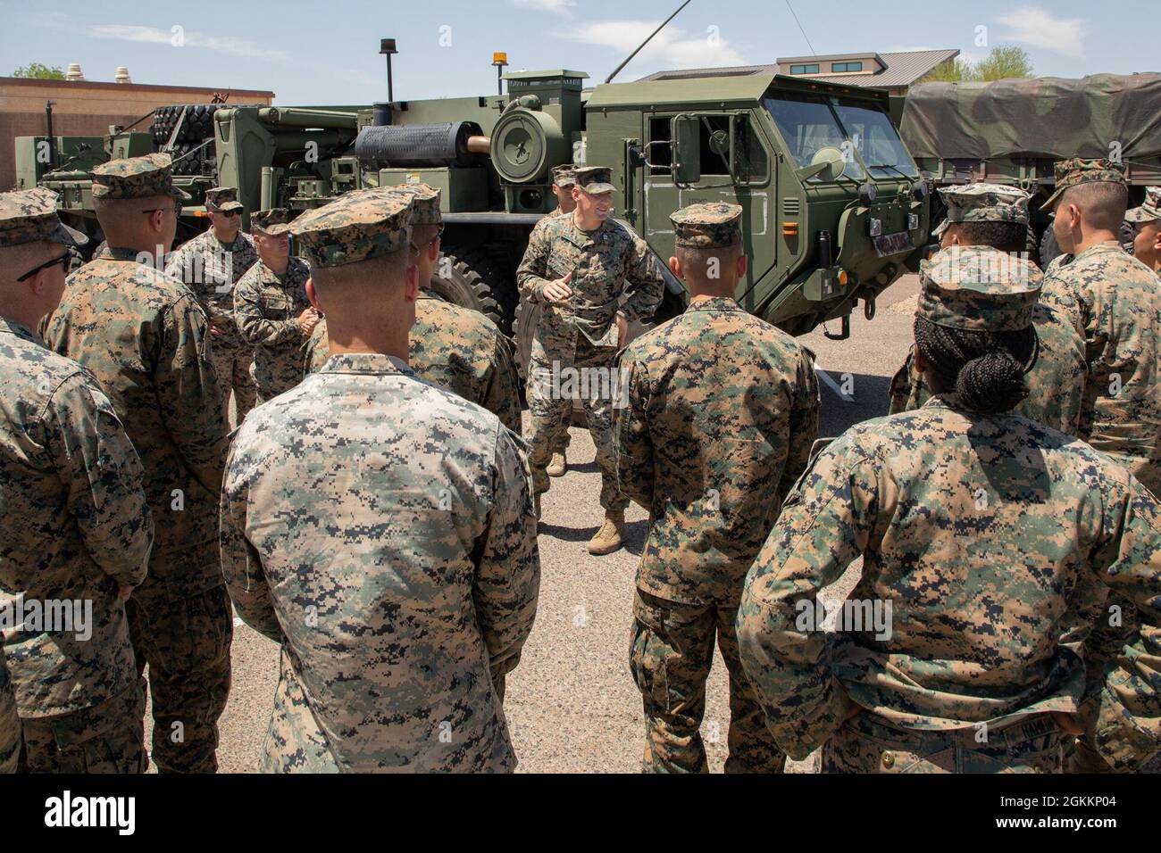 U.S. Marine Corps Capt. Adam Divine, a company commander, debriefs ...