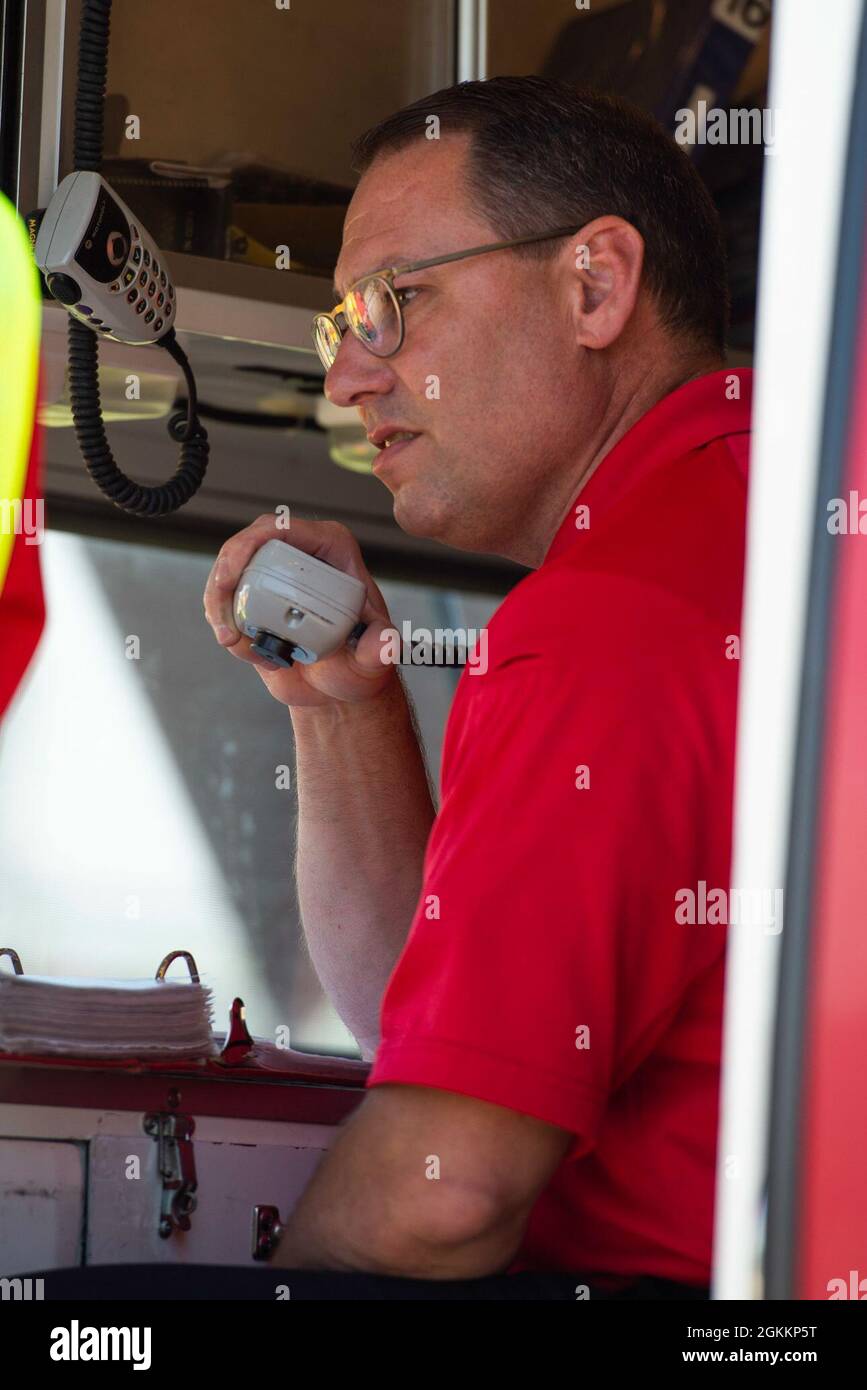 Jacob King, 788th Civil Engineer Squadron fire chief, radios responding ...