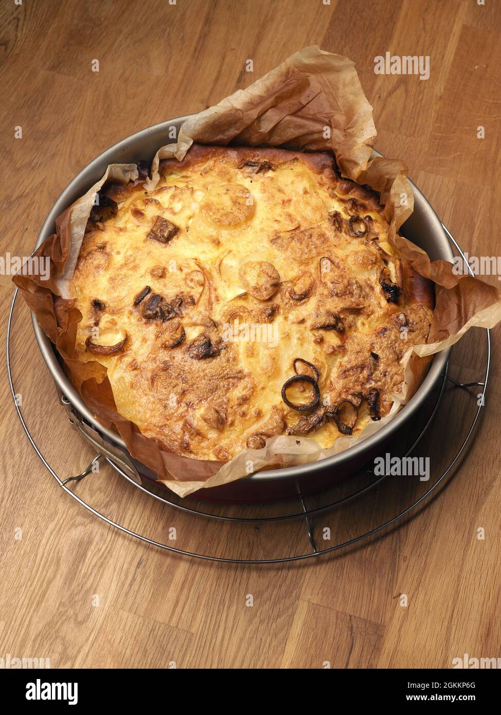 Quiche with potatoes and leeks in a springform pan, vegetarian food ...