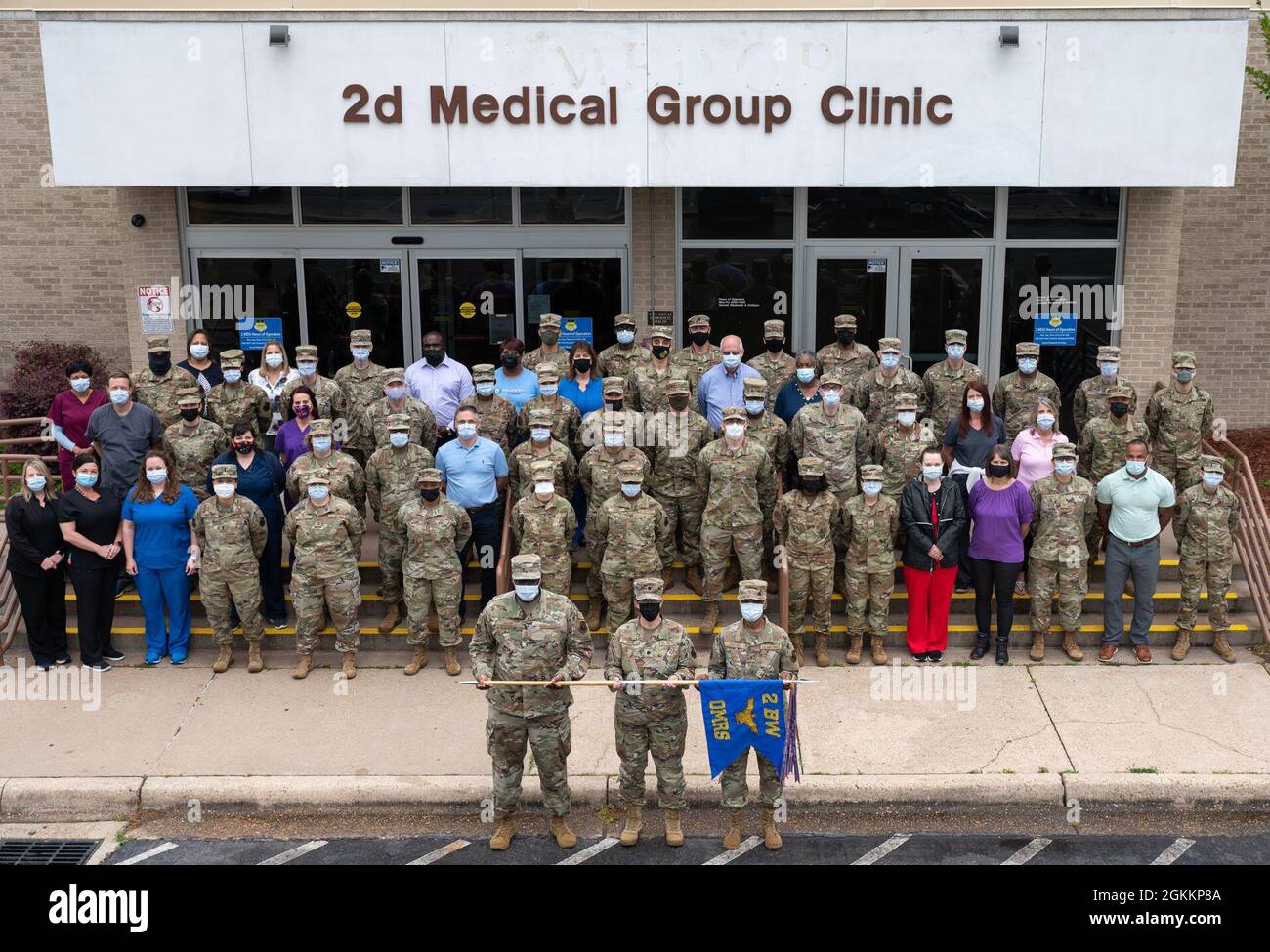 Members from the 2nd Operational Medical Readiness Squadron pose for a ...