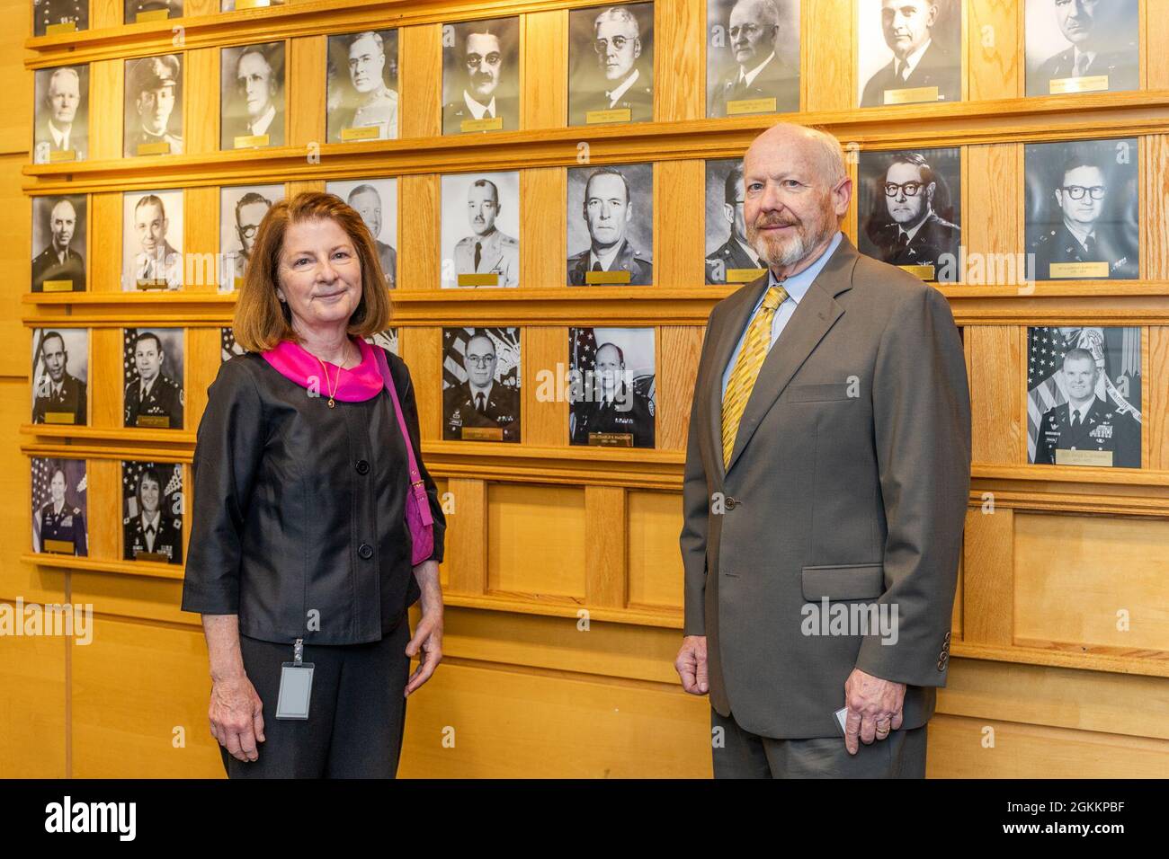 Retired Col. Charles McQueen (right) and Ms. Mary McQueen (left) pose ...