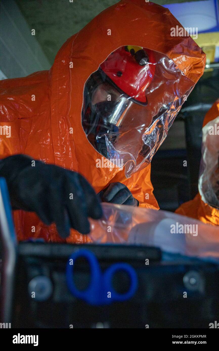 Sgt. Anthony Luiken, 103rd Civil Support Team, and Staff Sgt. Jonathan ...